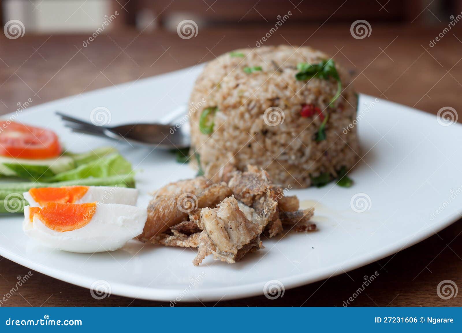 Spicy Fried Rice with Fried Fish with Salted Egg Stock Photo - Image of ...