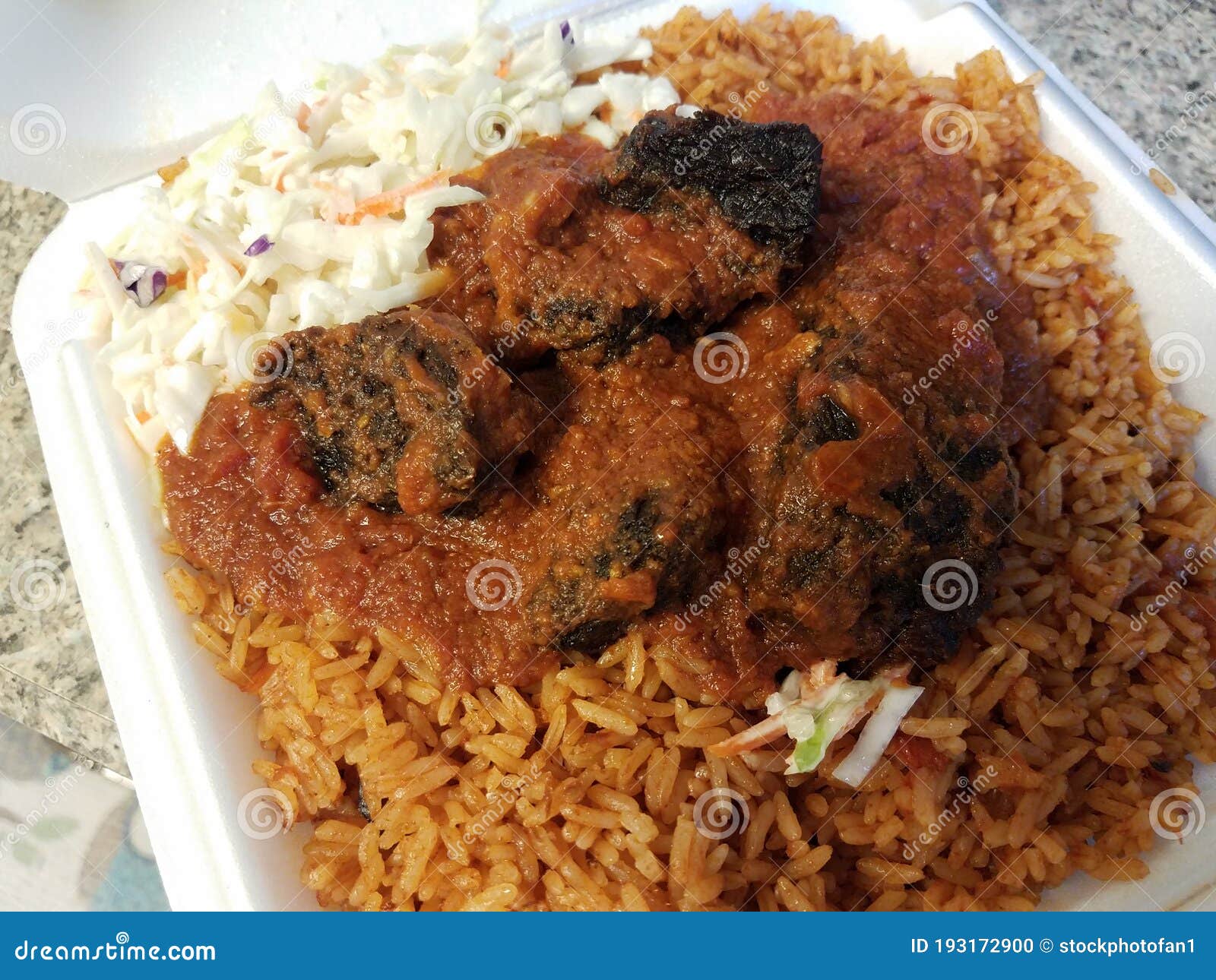 Spicy Goat and Rice African Food in Container Stock Photo - Image of ...