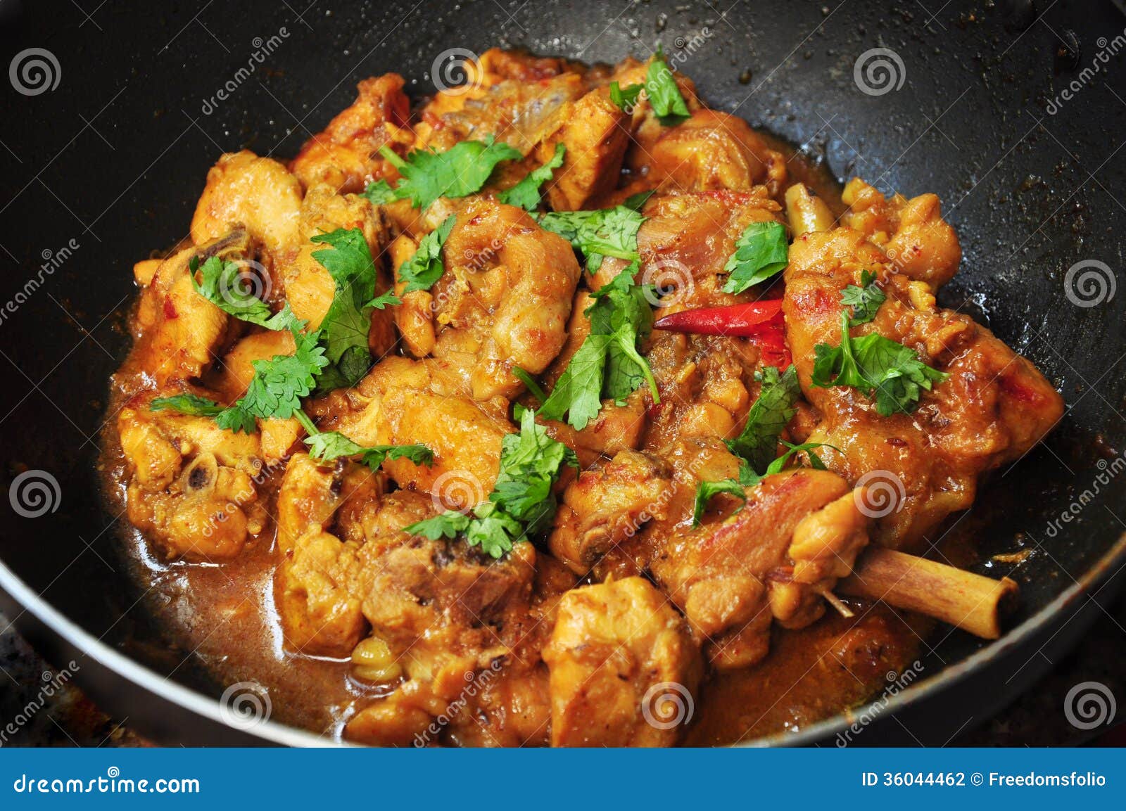 Spicy Indian chicken curry stock photo. Image of food - 36044462