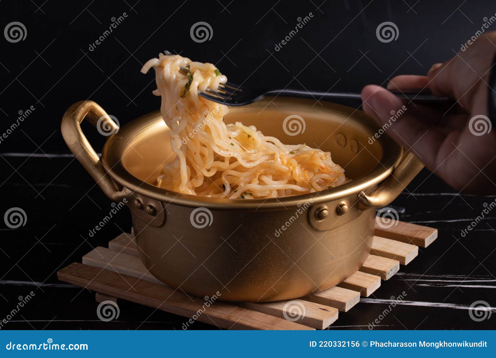 Spicy Instant Noodle in a Golden Pot with Mozzarella Cheese Stock Photo ...