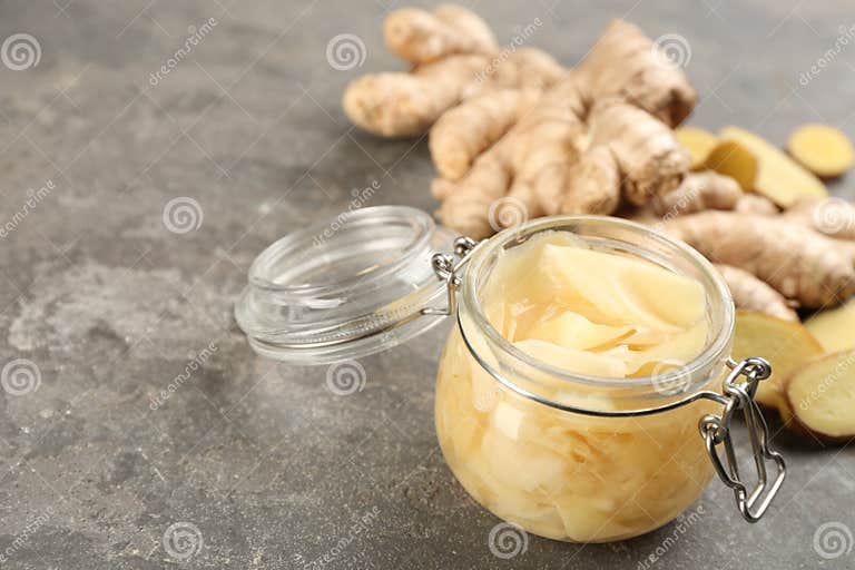 Spicy Pickled Ginger and Root on Light Grey Table, Closeup. Space for ...