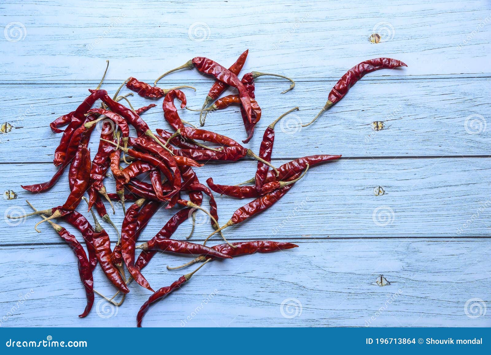 Spicy Red Chilli Powder with Super Chilli Background Stock Photo ...