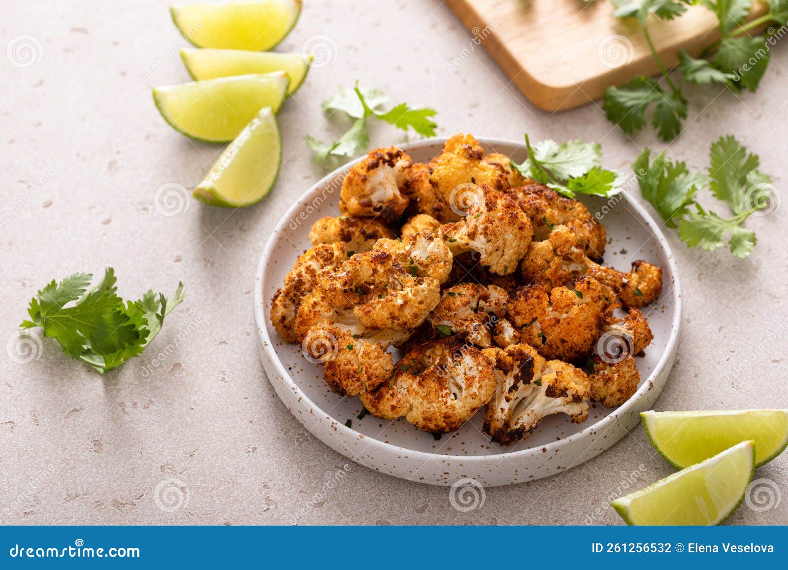 Spicy Roasted Cauliflower Served with Lime and Cilantro Stock Photo ...
