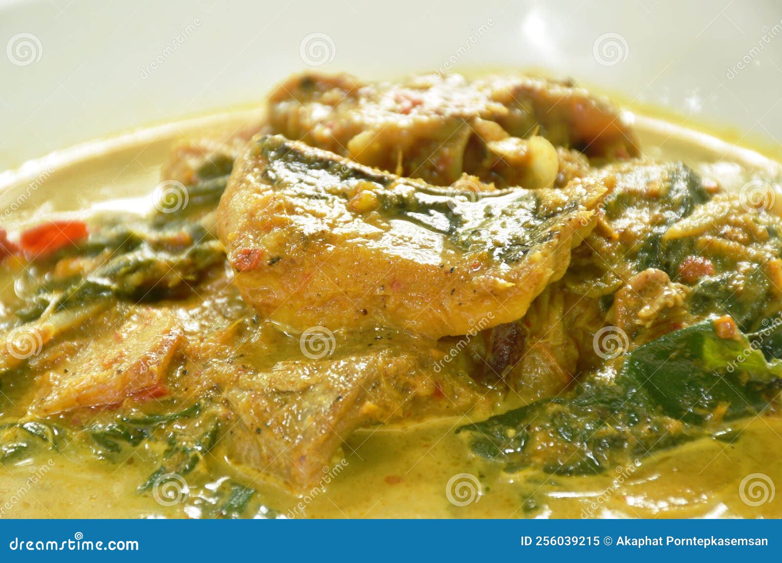 Spicy Spicy Slice Stingray Fish in Coconut Milk Curry on Plate Stock ...