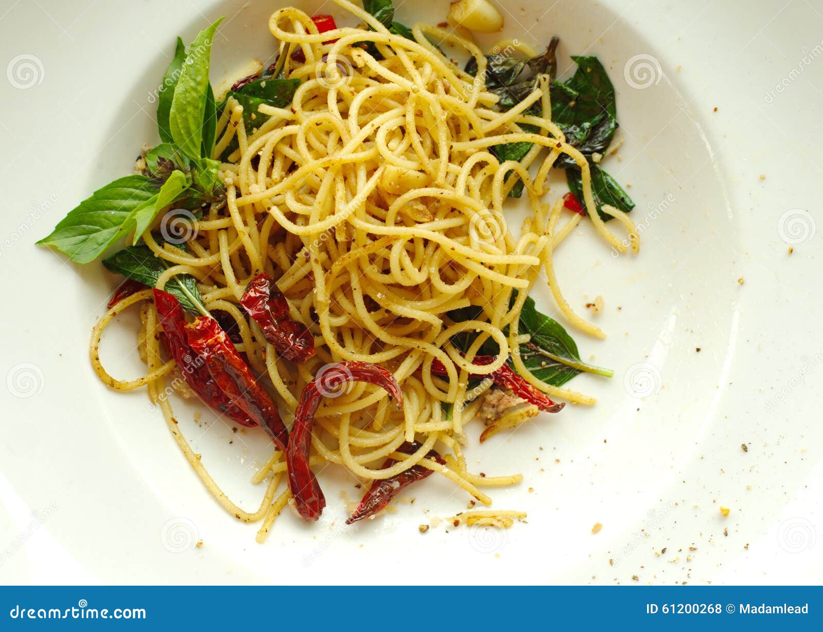 Spicy Spaghetti with Salted Fish Stock Photo - Image of noodles, basil ...