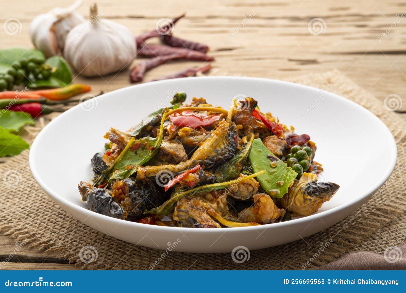 Spicy Stir Fried Frog Meat with Chilli Paste and Basil Leave Stock ...