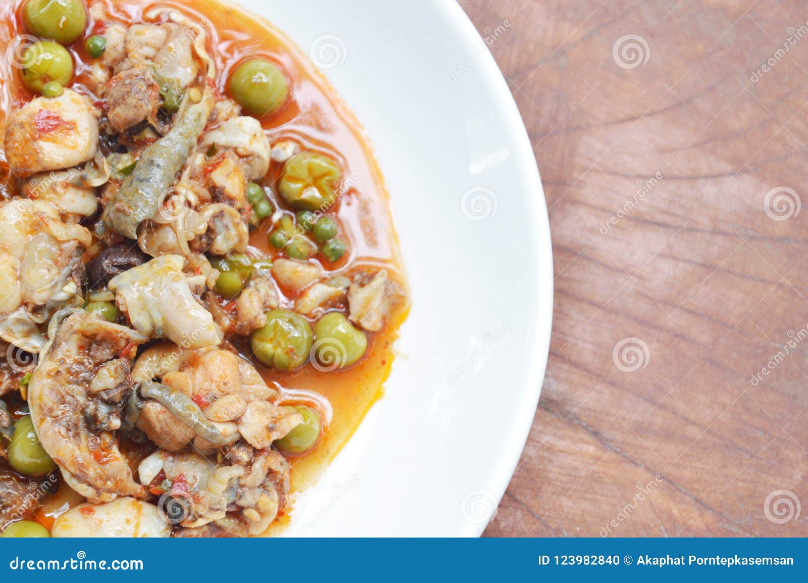 Spicy Stir Fried Frog Meat and Eggplant Curry on Plate Stock Photo ...