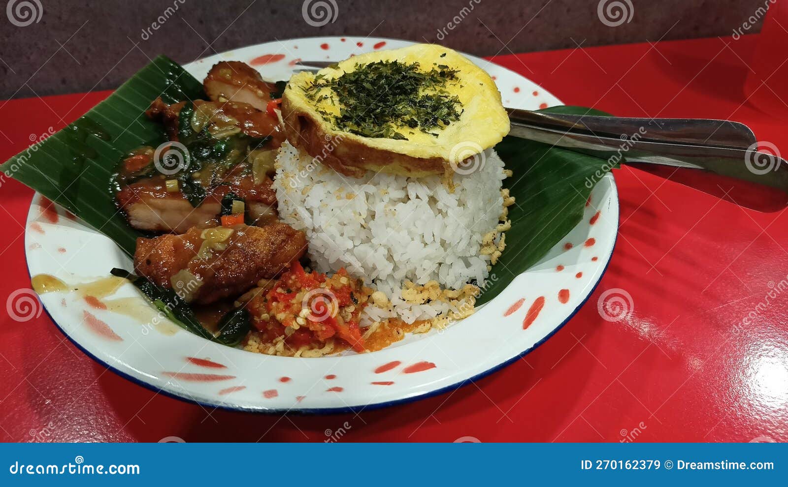 Spicy Thai Roasted Chicken with White Rice and Egg on Top Stock Image ...