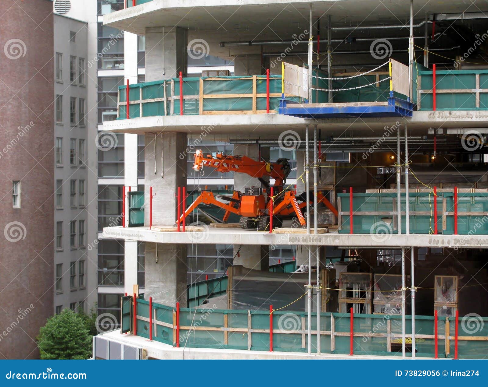 Spider Crane at the Building Construction Site Stock Photo - Image of ...