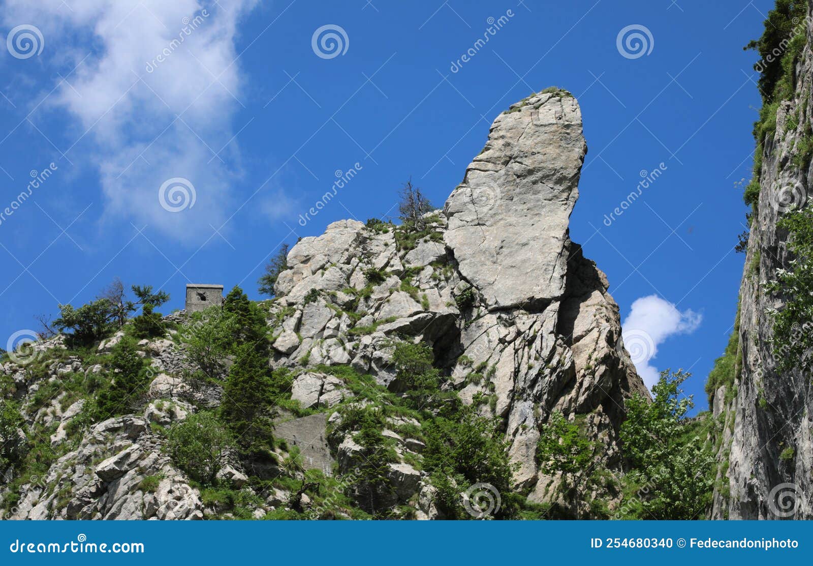Spike Rock Like a Big Nose in the Alps Stock Photo - Image of mountain ...
