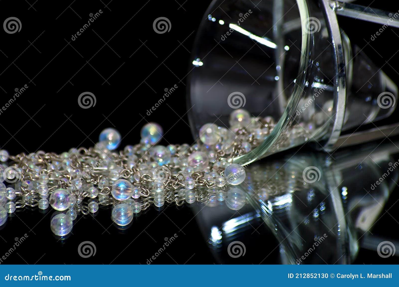 Spilled Beads on Gray Glass Stock Photo - Image of glass, life: 212852130