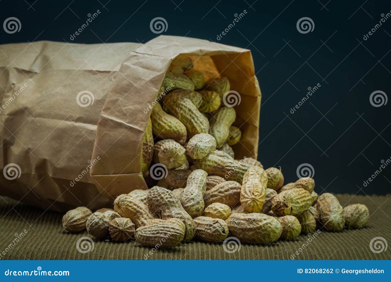 Spilled Brown Bag of Peanuts Stock Photo - Image of peanut, sack: 82068262
