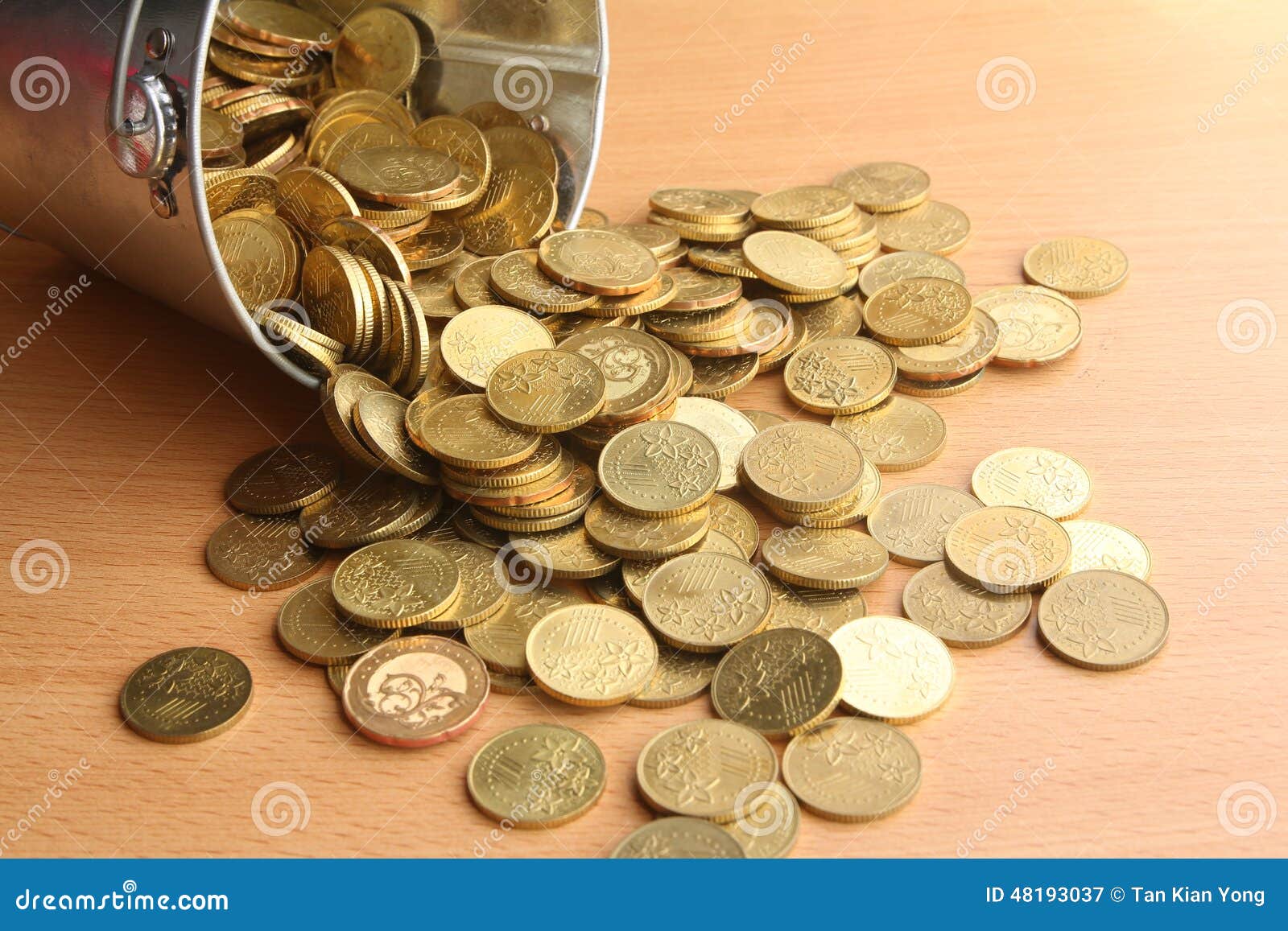 Spilled Bucket of Gold Coins Stock Image - Image of savings, coins ...