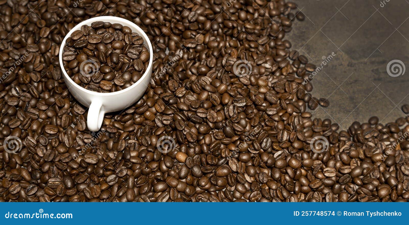 Spilled Coffee Beans, a Cup of Coffee and Coffee Beans on the Table ...