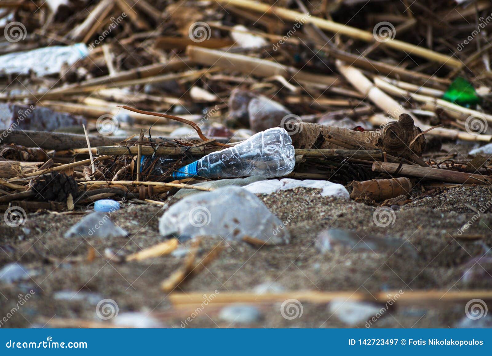 Spilled Garbage on the Beach.Empty Used Plastic Bottle Stock Image ...