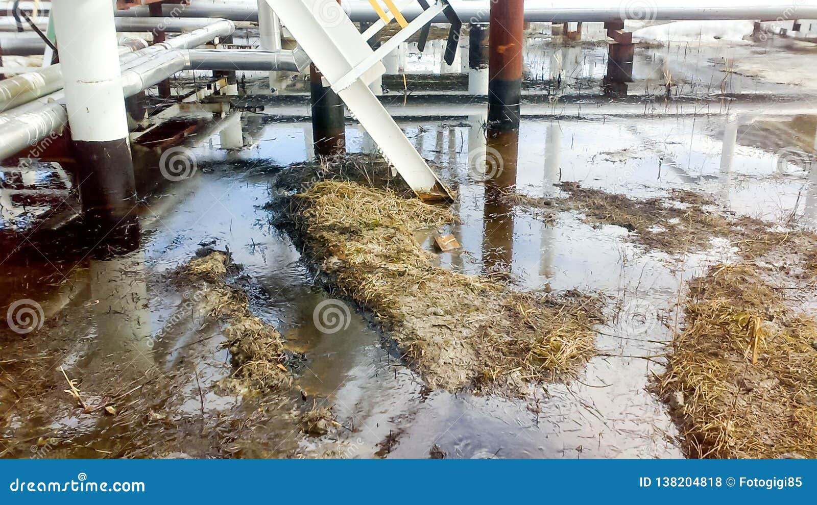 Spilled Oil on Sandy Soil Near Pipelines and Process Equipment. Oil ... Spilled Oil on Sandy Soil Near Pipelines and Process Equipment. Oil ...