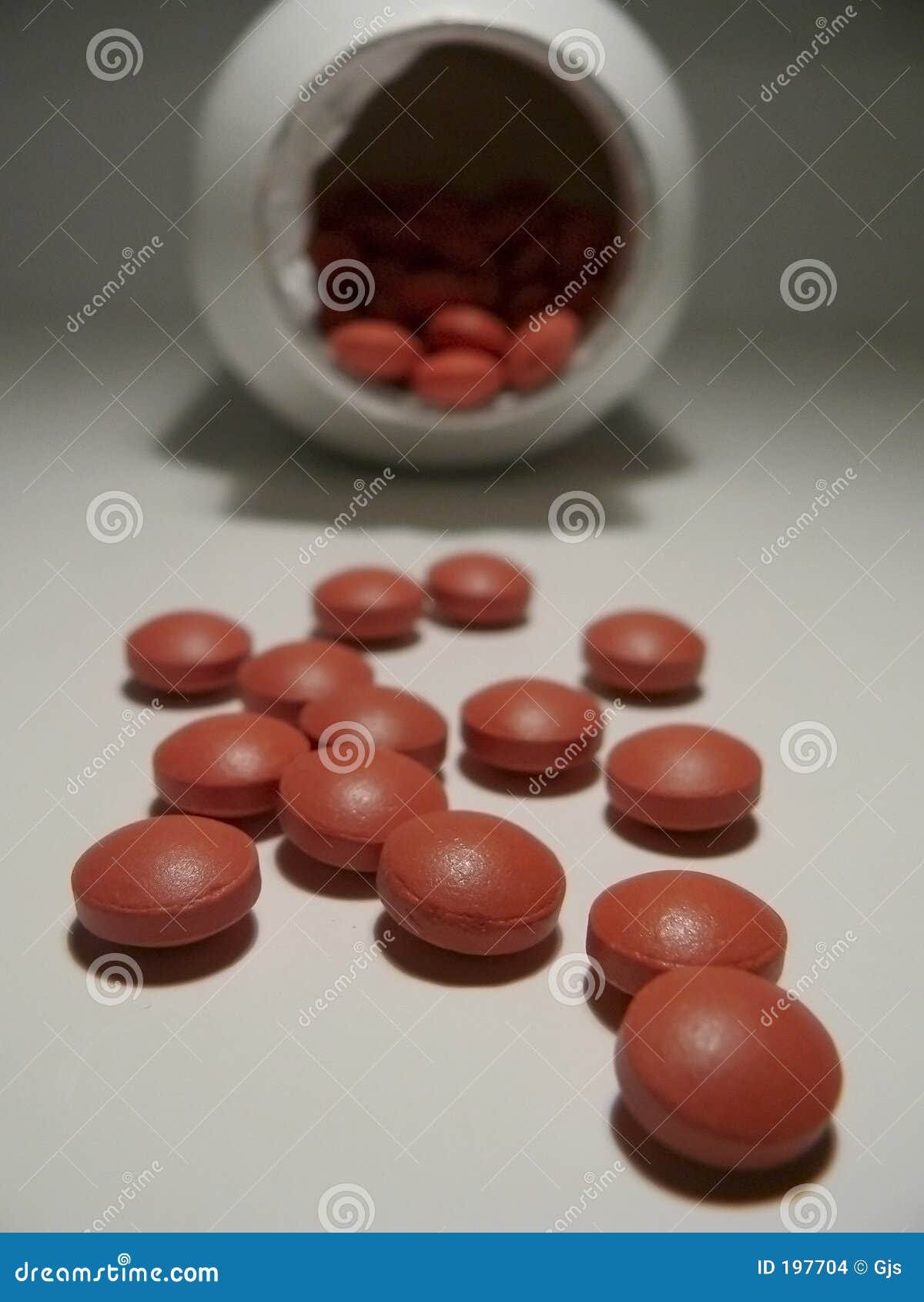 Spilled pills and bottle stock photo. Image of pills, pharmaceutical ...