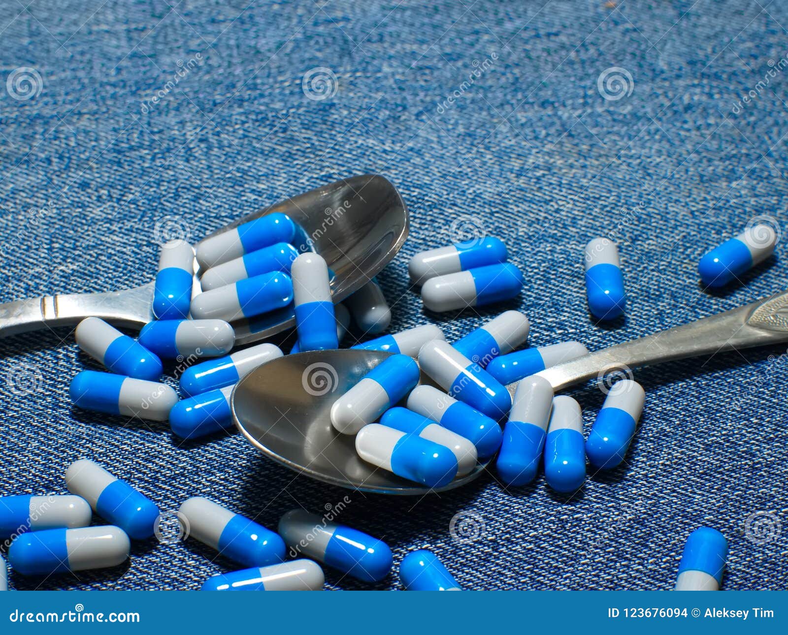 Spilled pills on the table stock photo. Image of drugs - 123676094