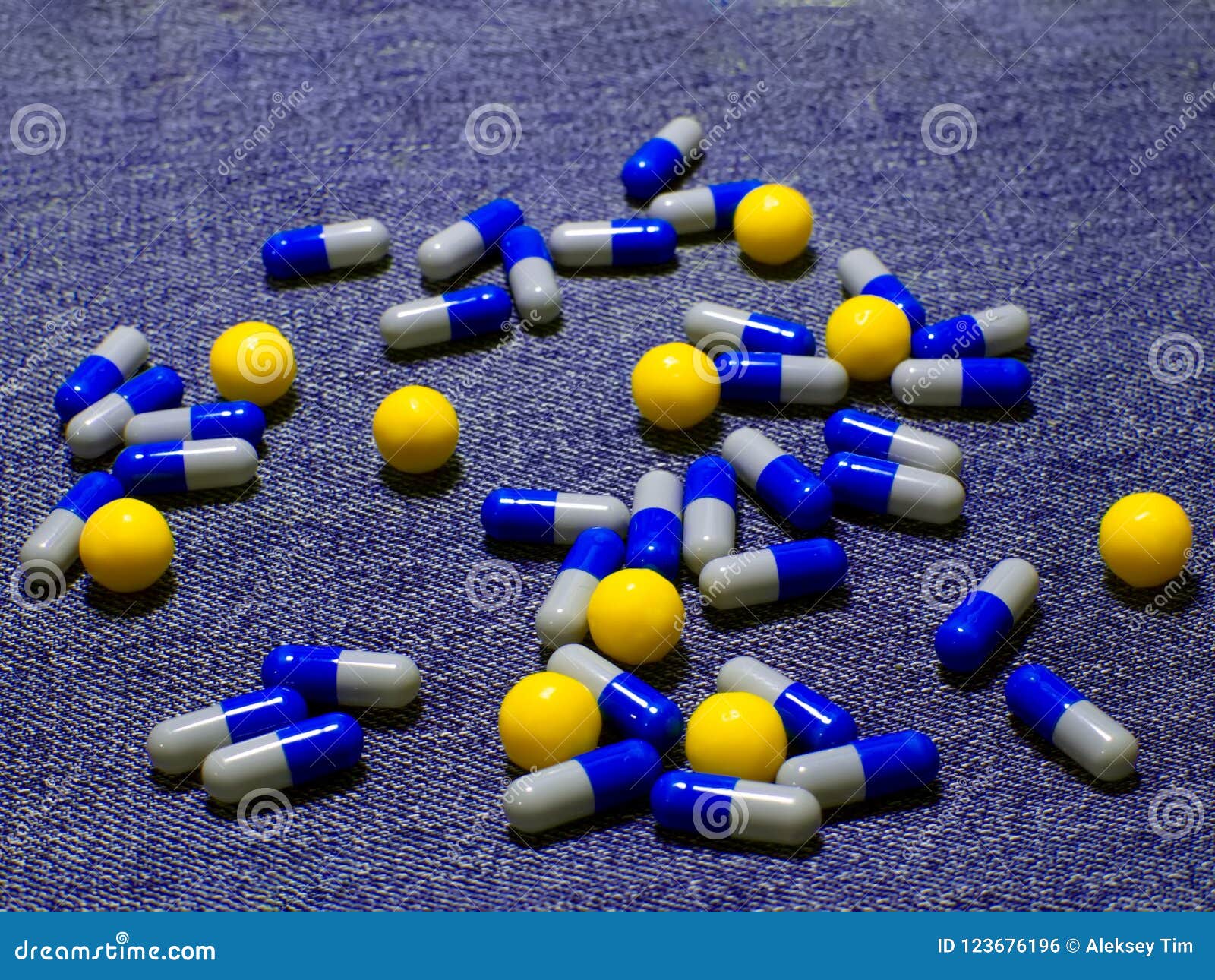 Spilled pills on the table stock photo. Image of treatment - 123676196