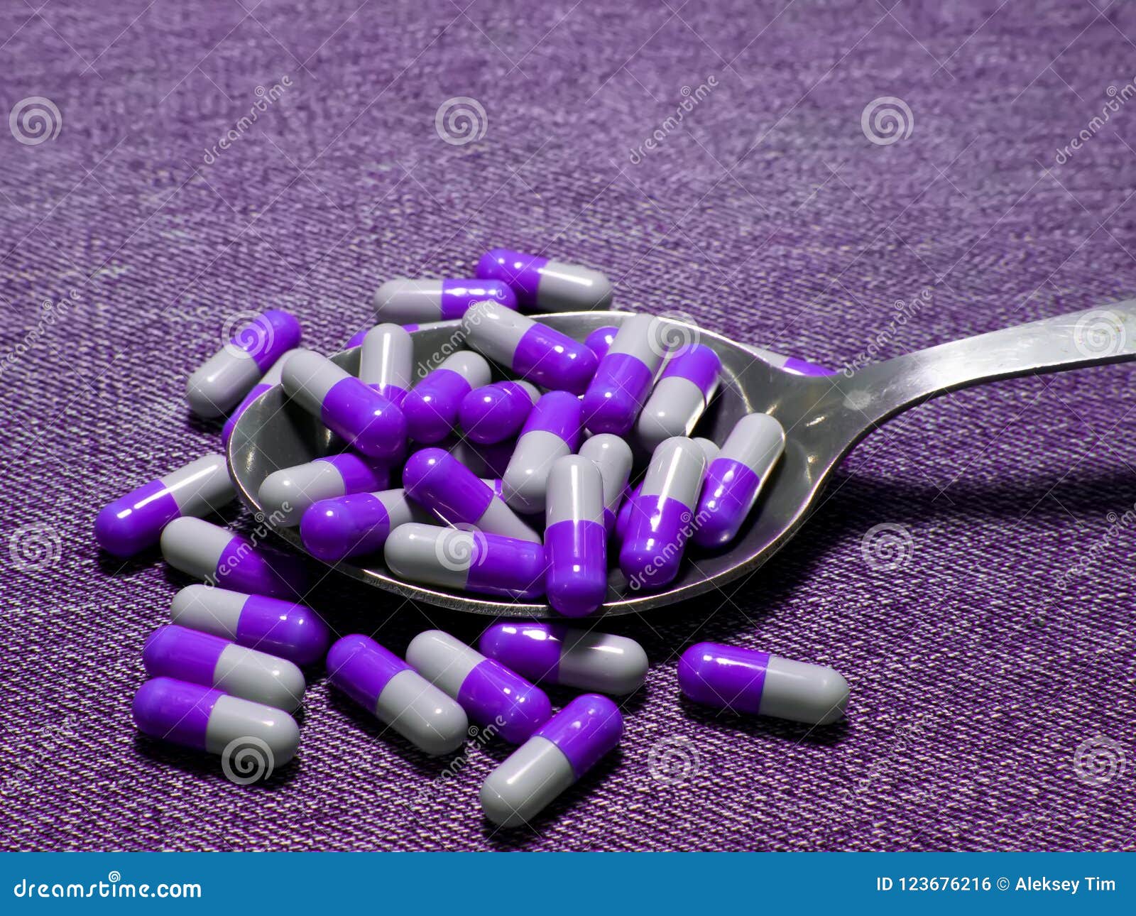 Spilled pills on the table stock photo. Image of capsule - 123676216
