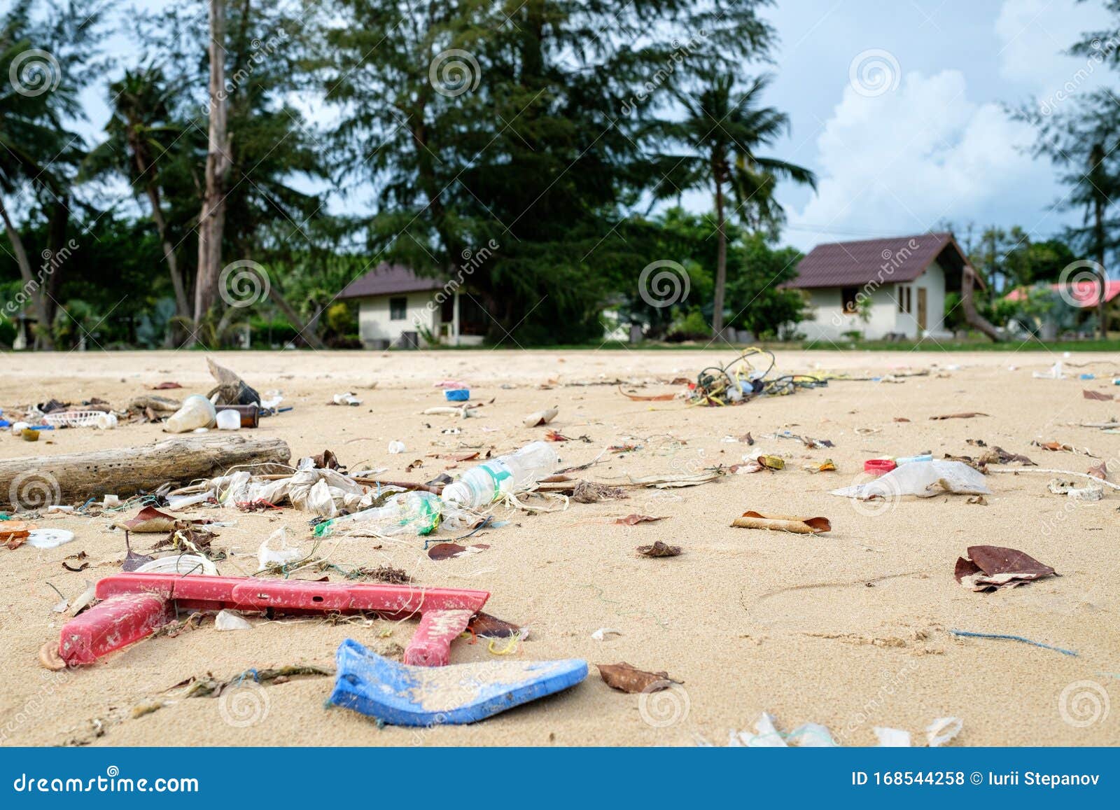 Spilled Plastic on the Beach. Ecological Problem Concept Stock Photo ...