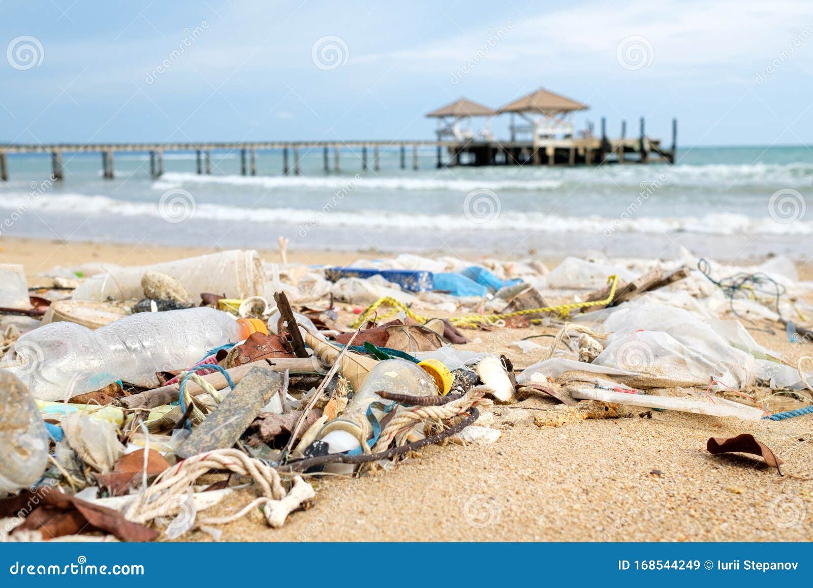 Spilled Plastic on the Beach. Ecological Problem Concept Stock Image ...
