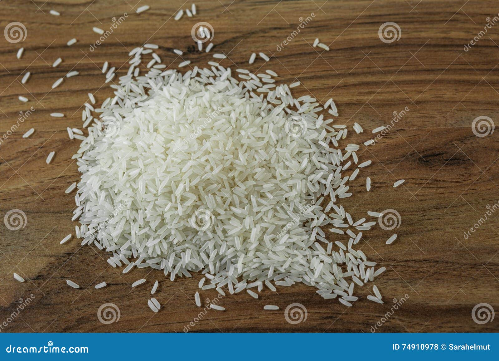 Spilled rice on the table stock photo. Image of agricultural - 74910978