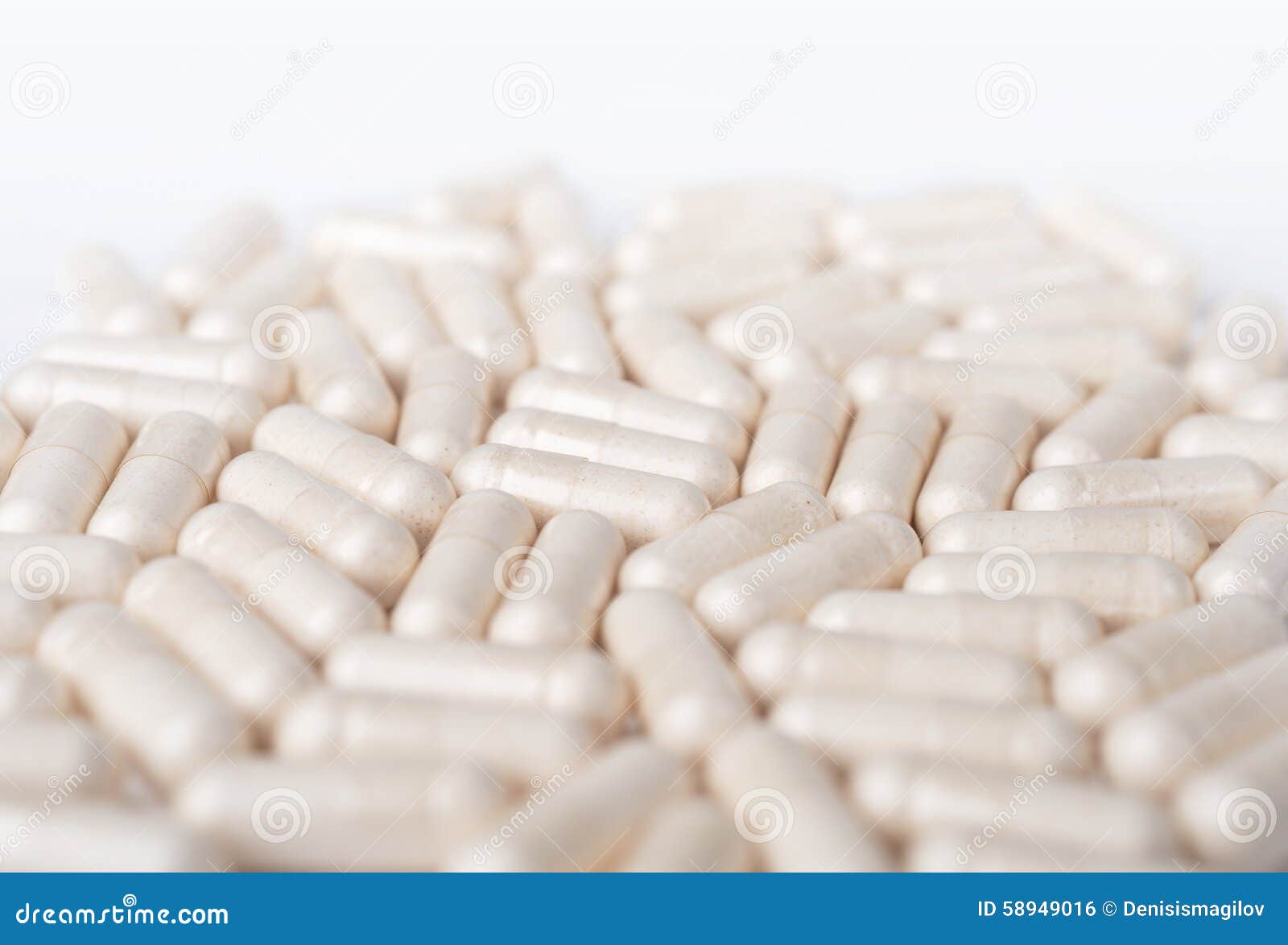 Spilled White Capsules. Stock Photo | CartoonDealer.com #58949016