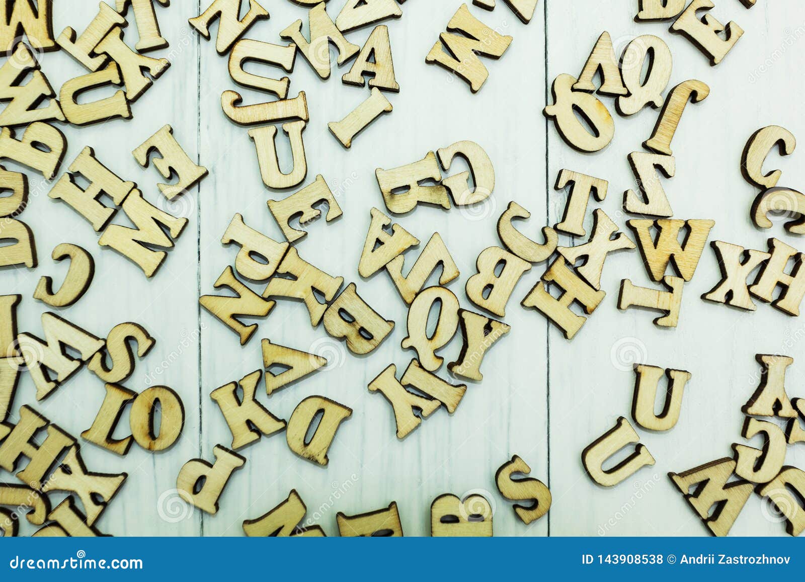 Spilled Wooden Letters on a White Wooden Background Stock Photo - Image ...