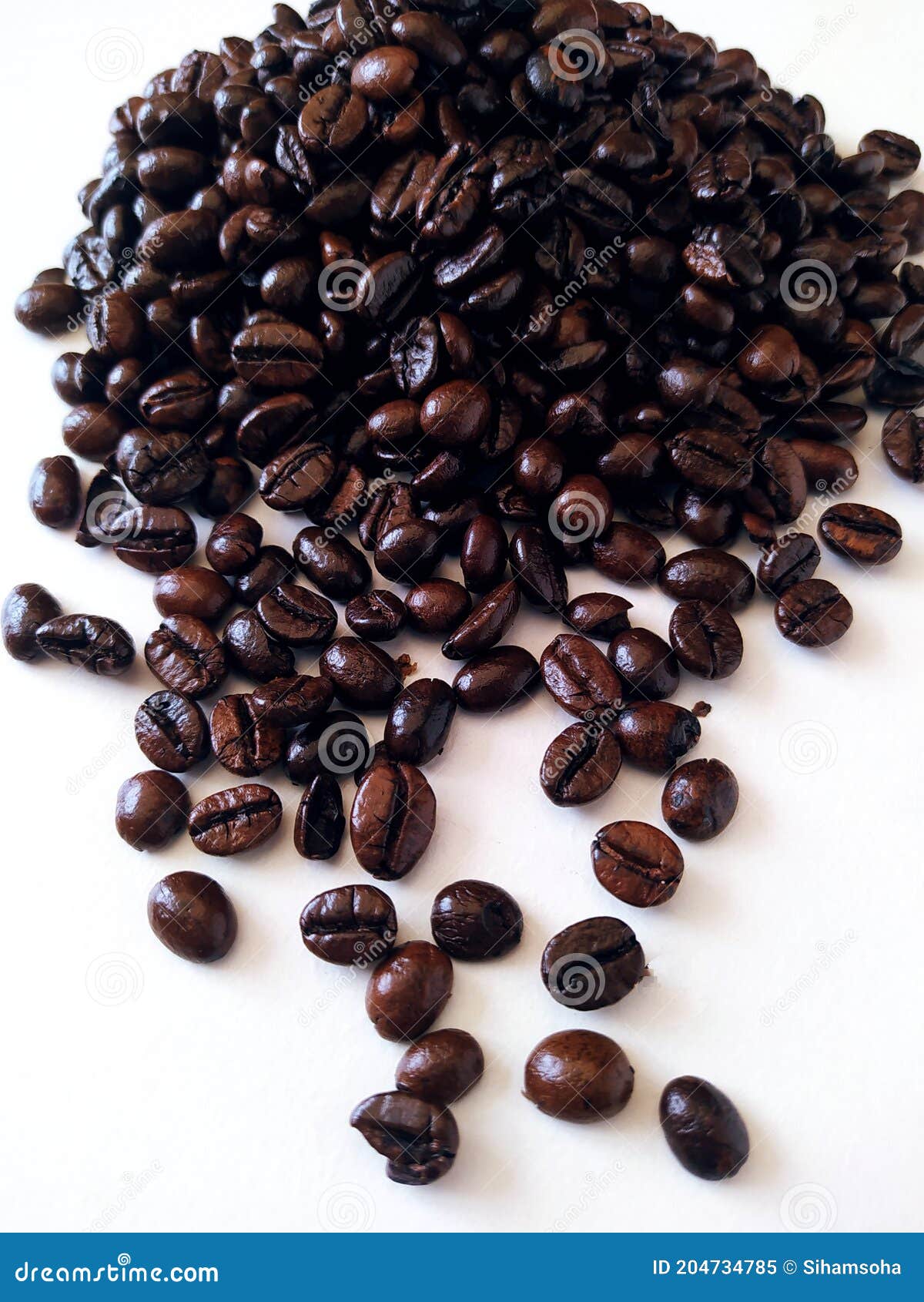 Coffee Beans Spilling in a while Background Stock Image - Image of ...