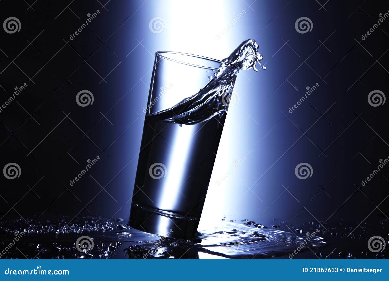 Spilling glass of water stock image. Image of blue, backlit - 21867633