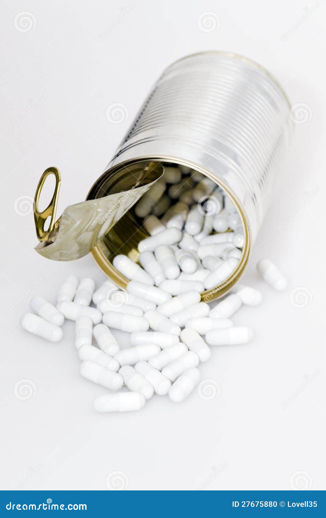 Spilling pills from can stock photo. Image of pharmaceuticals - 27675880