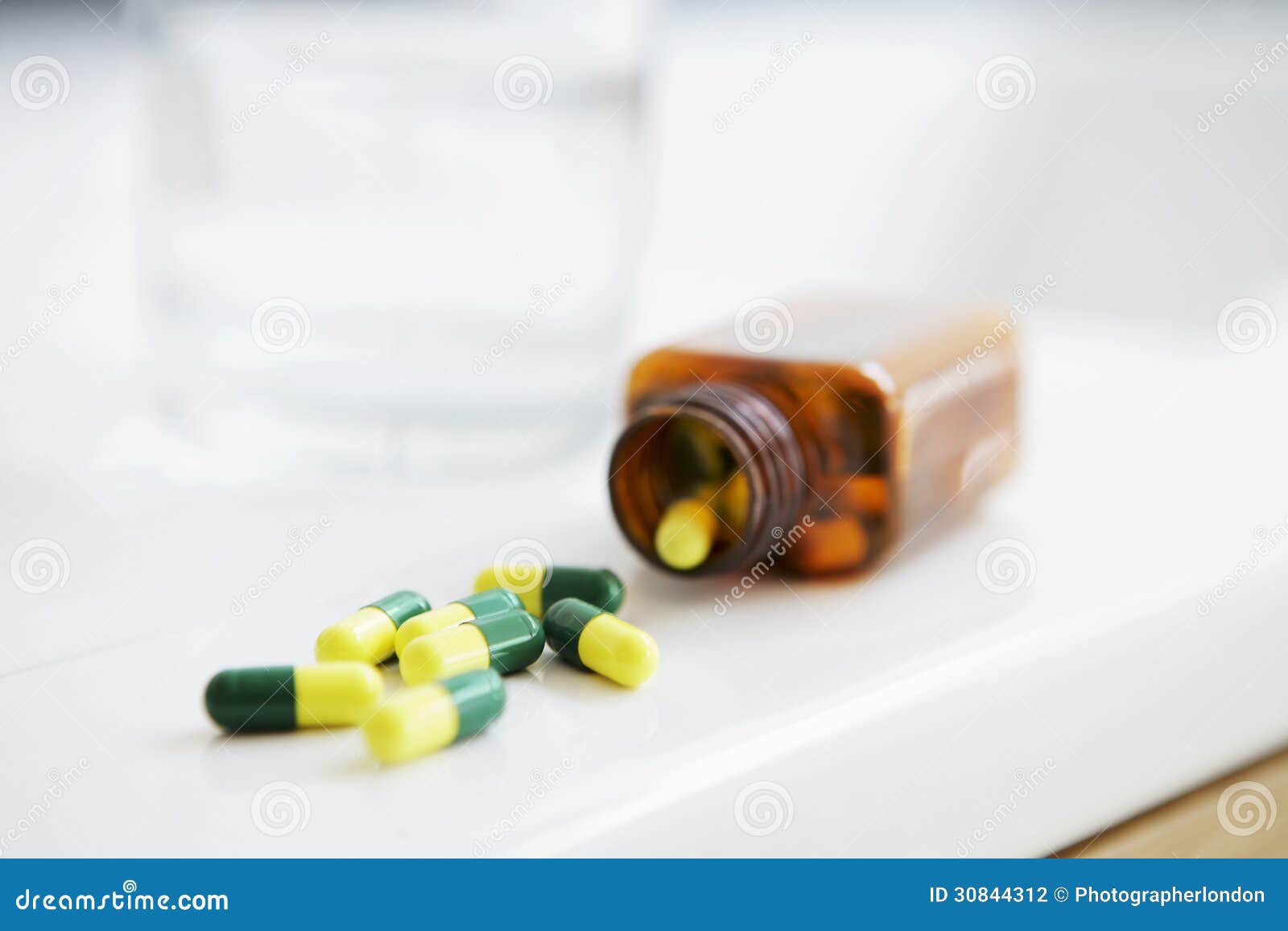 Spilt Bottle of Pills on Counter Close Up Stock Photo - Image of ...