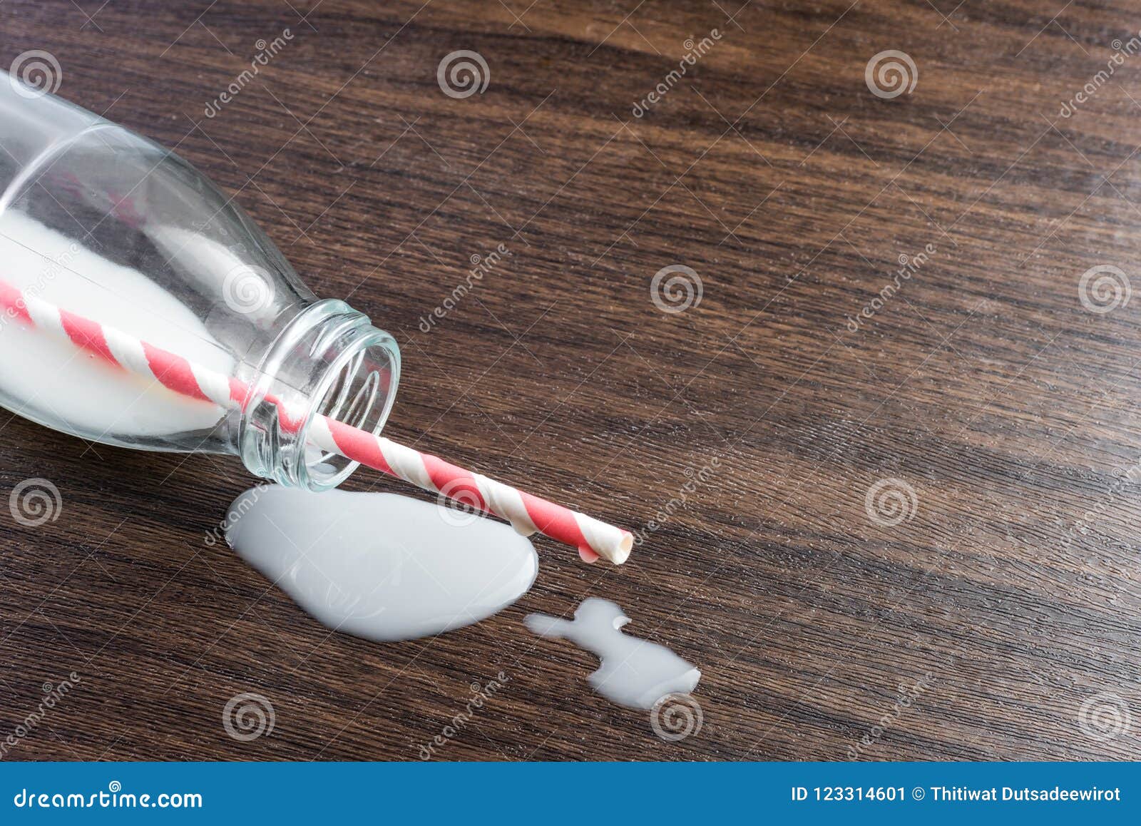 Spilt milk from bottle stock image. Image of bottle - 123314601