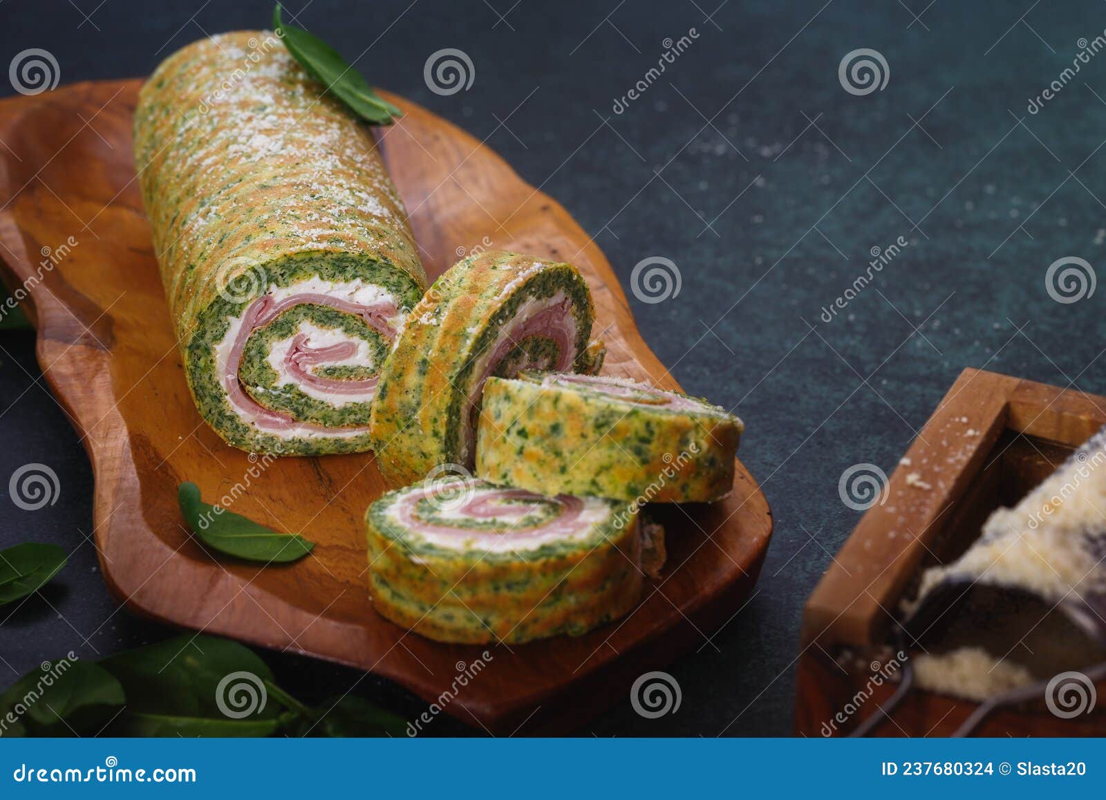 Spinach Roulade Filled with Tomatoes, Ham and Ricotta Stock Photo ...