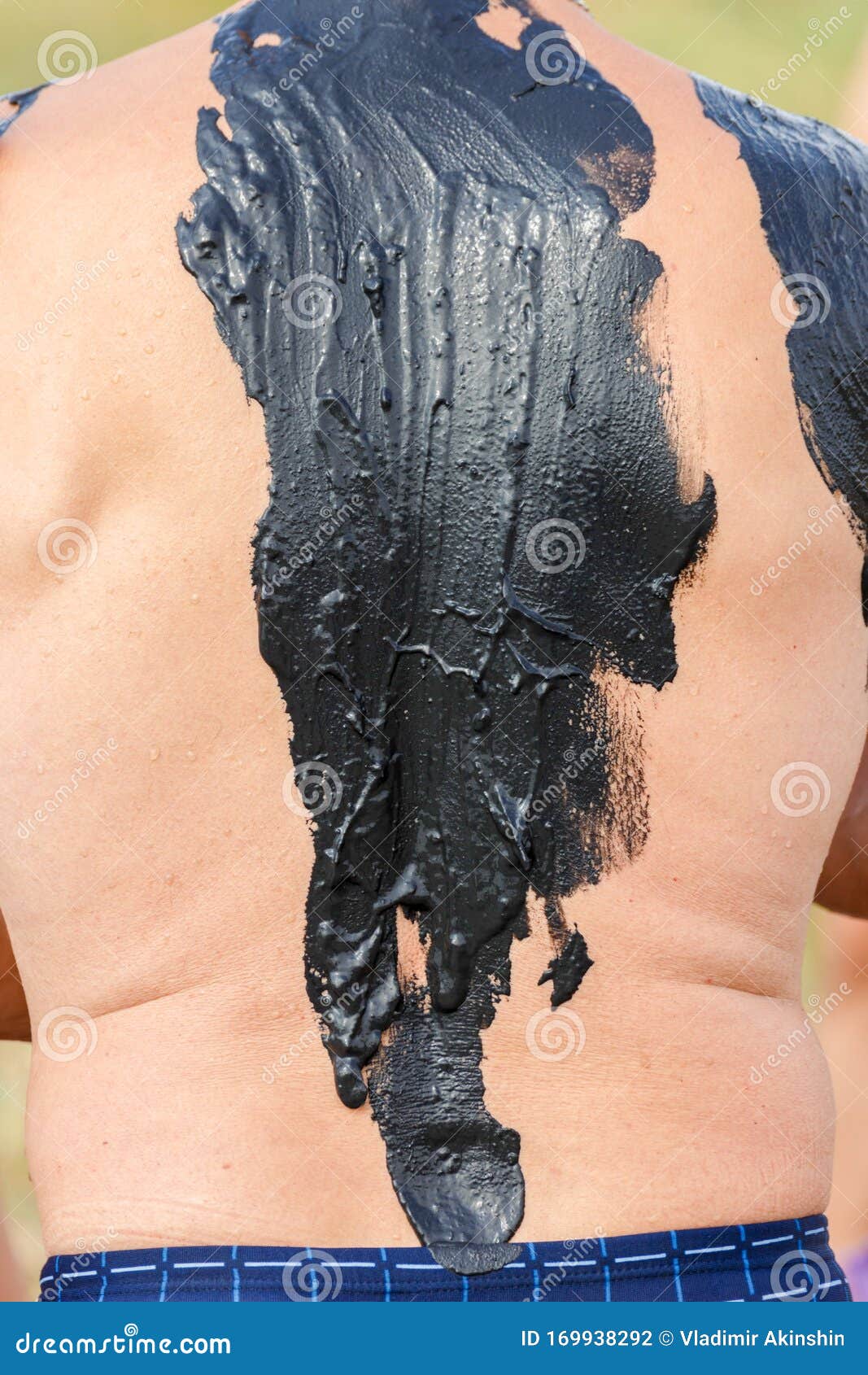 The Spine of a Man is Covered with Healing Mud Stock Photo - Image of ...