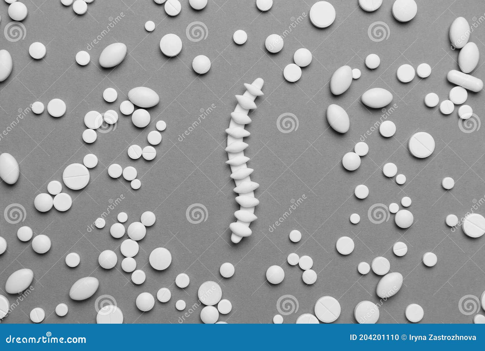 Spine with Pills on Grey Background. Back Pain and Treatment Stock ...