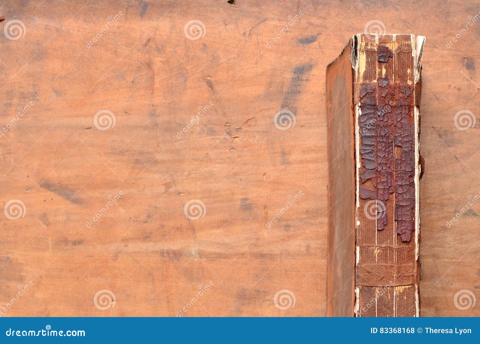 Spine of a Vintage Leather Bound Book on Old Rustic Wood Stock Photo ...