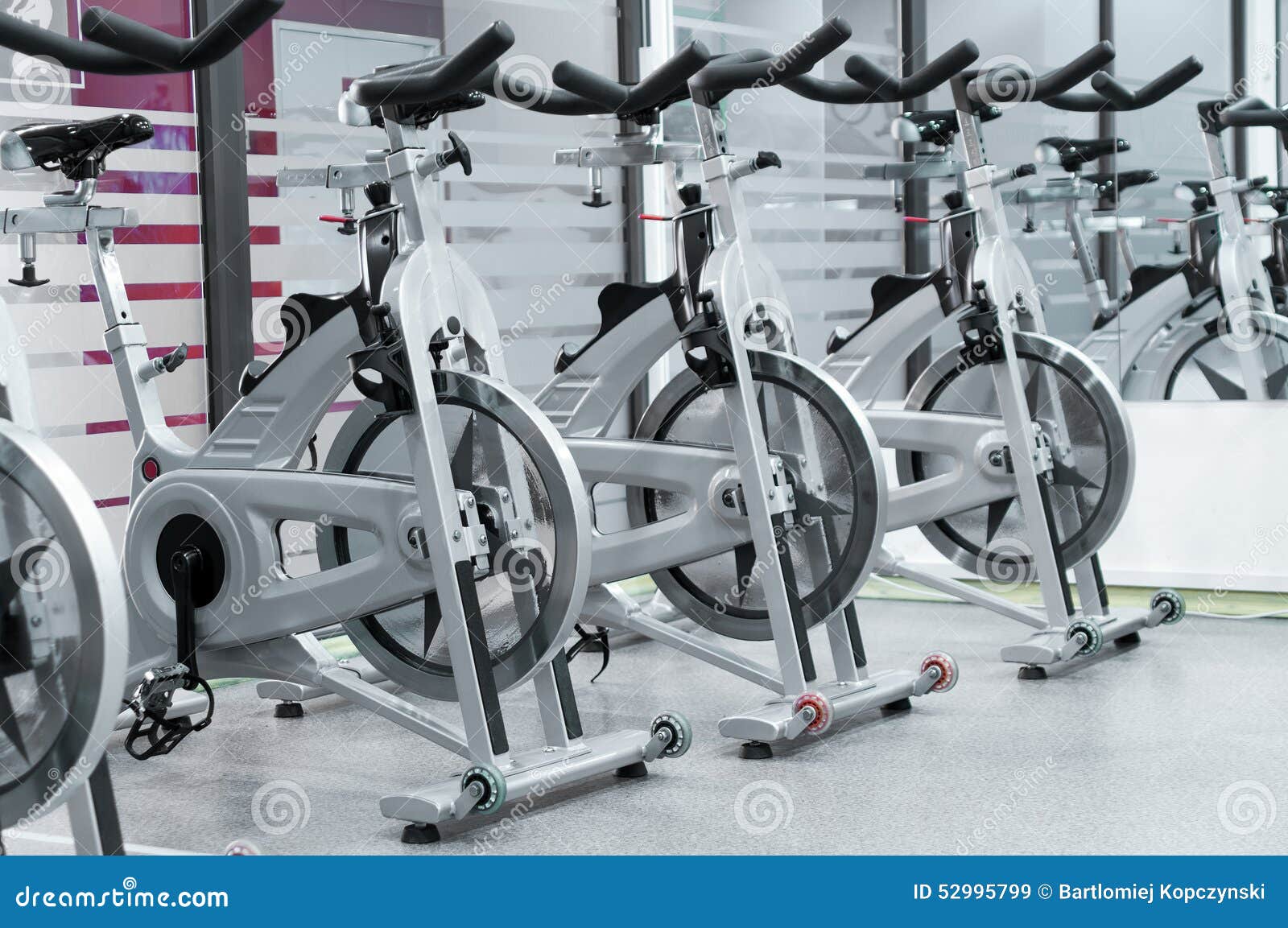 Spinning bikes stock image. Image of club, blue, cycle - 52995799