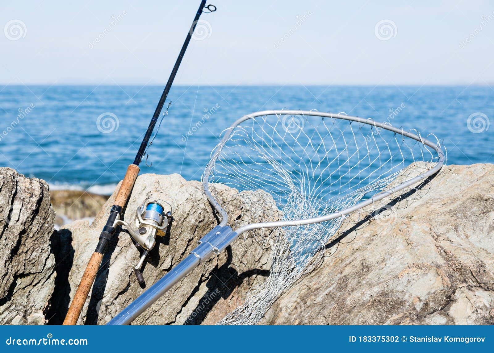 Spinning and Fishing Net on the Rocks Stock Photo - Image of netting ...