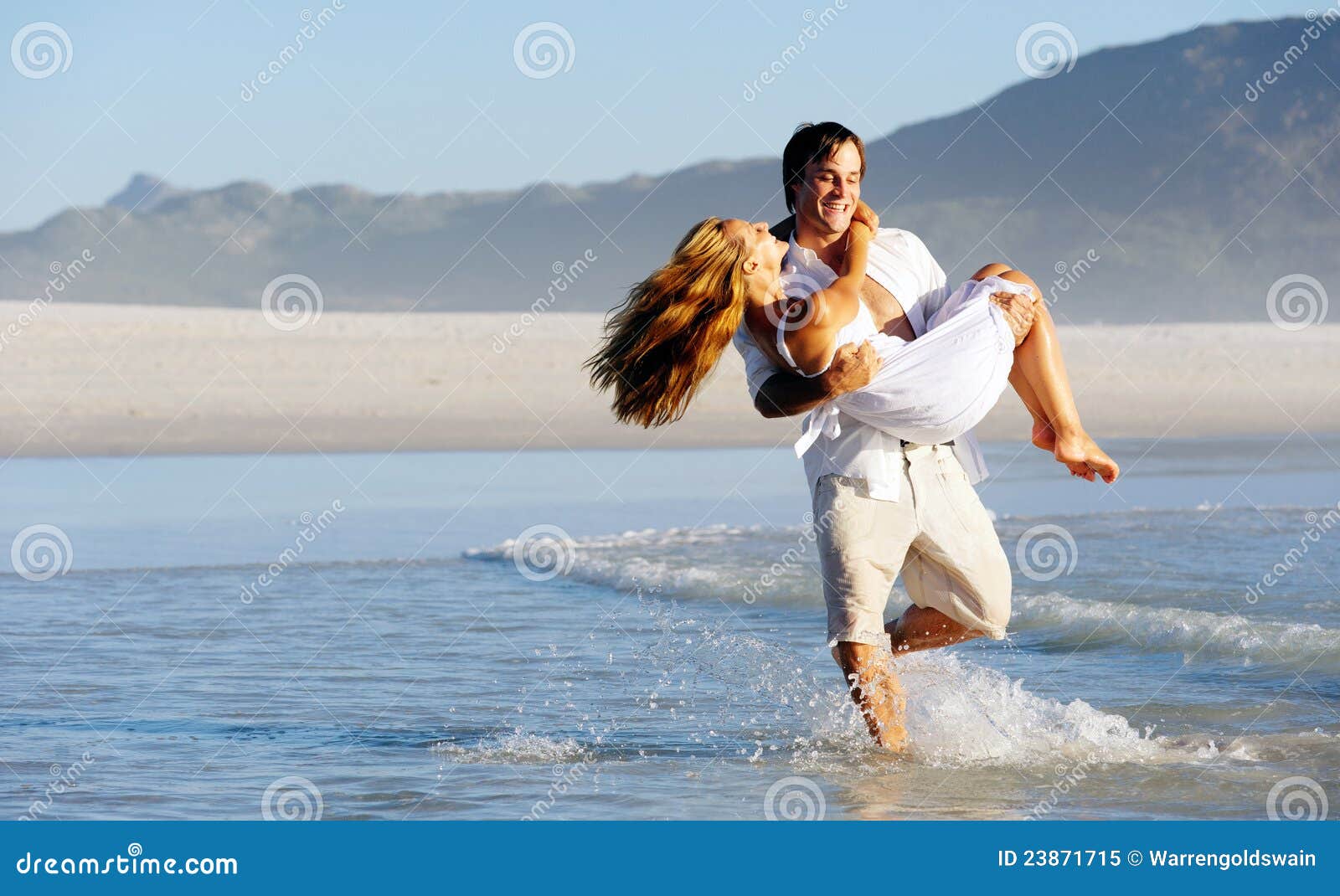 Spinning honeymoon couple stock image. Image of carefree - 23871715
