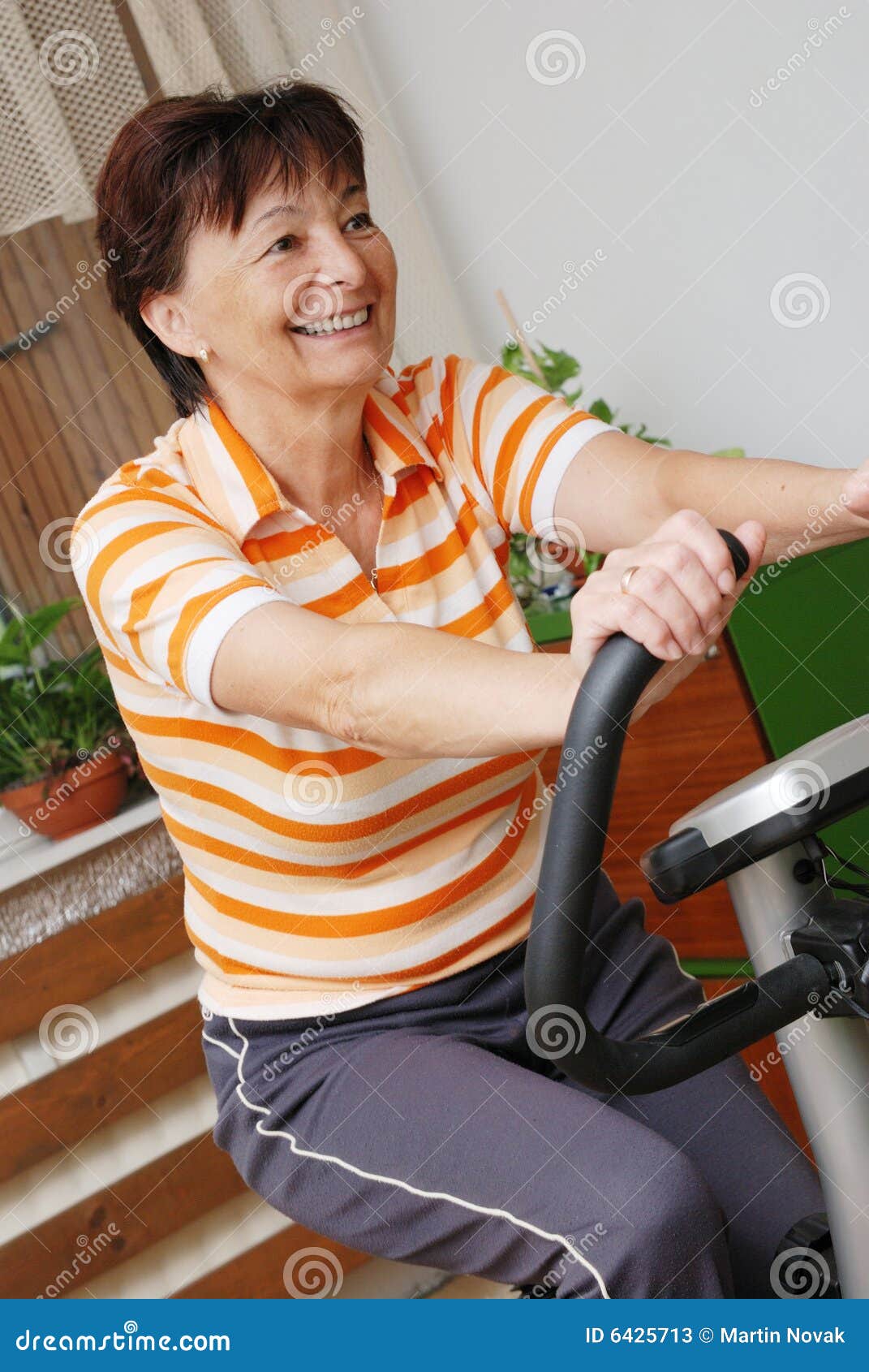 Spinning mature woman stock image. Image of senior, retirement - 6425713