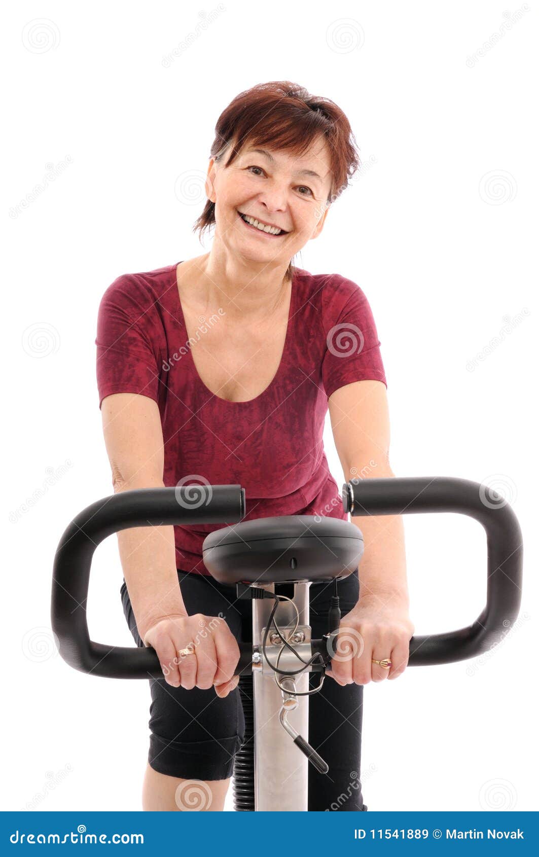 Spinning senior woman stock image. Image of reduction - 11541889