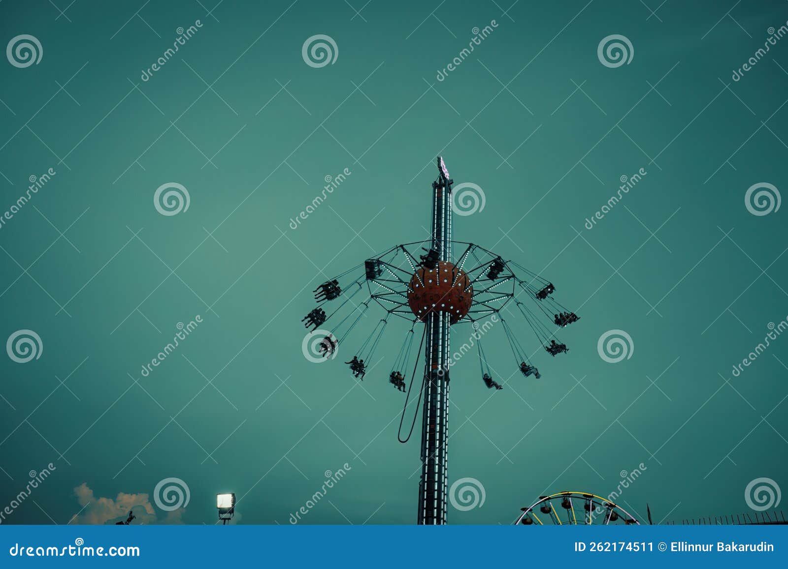 Spinning Tower Chair Moving at the Fun Fair at Night Stock Image ...