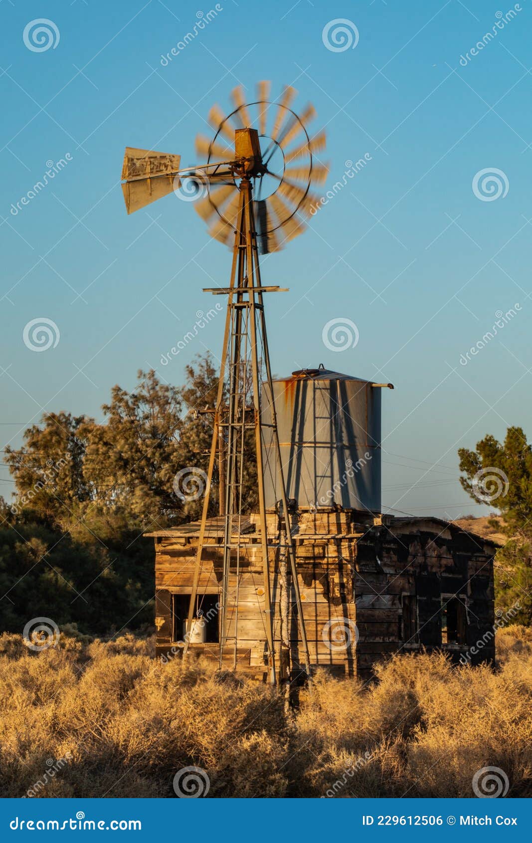 Spinning Windmill stock photo. Image of turn, spins - 229612506
