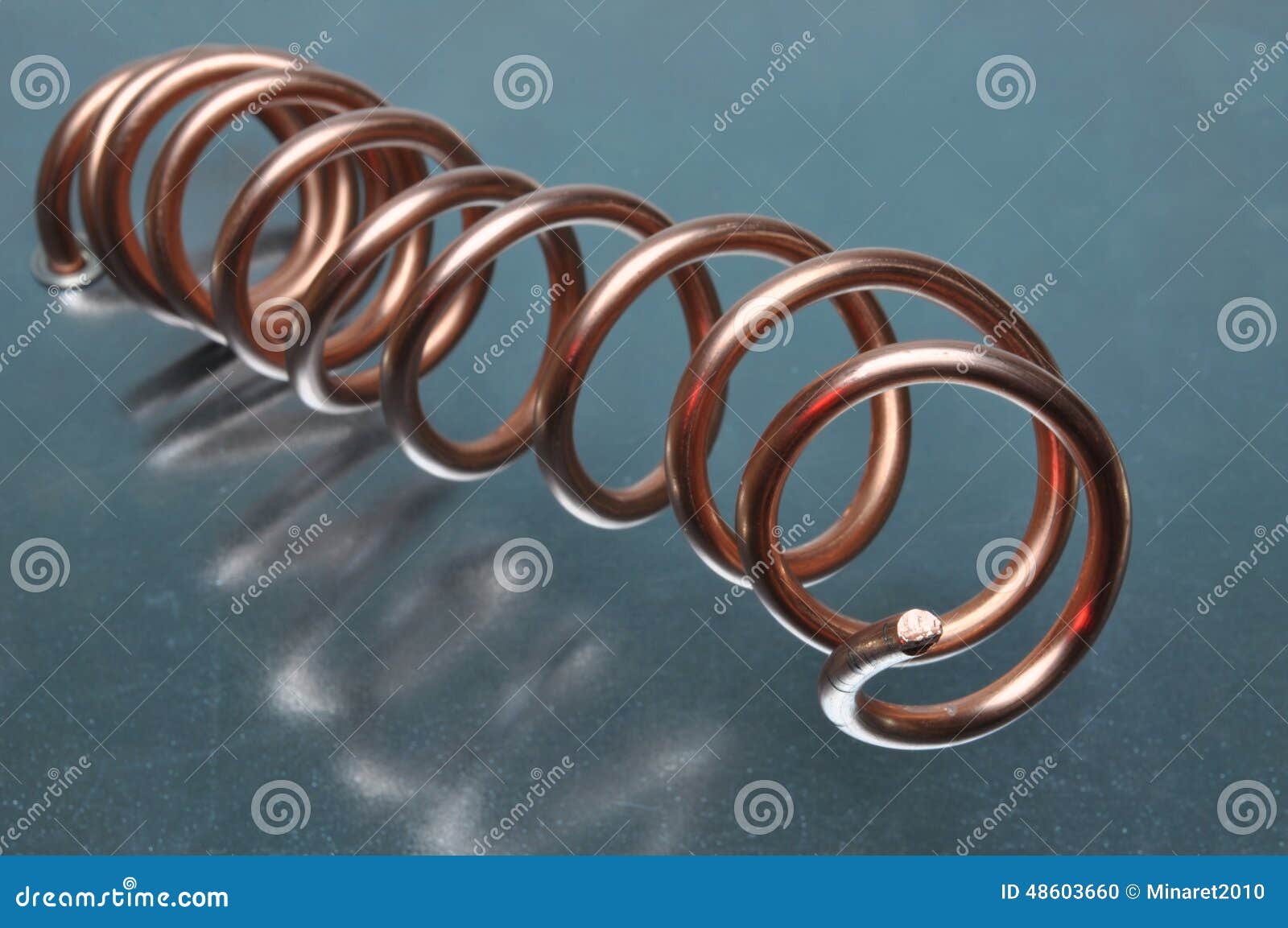 Spiral of Copper Wire on Metal Surface Stock Photo - Image of energy ...