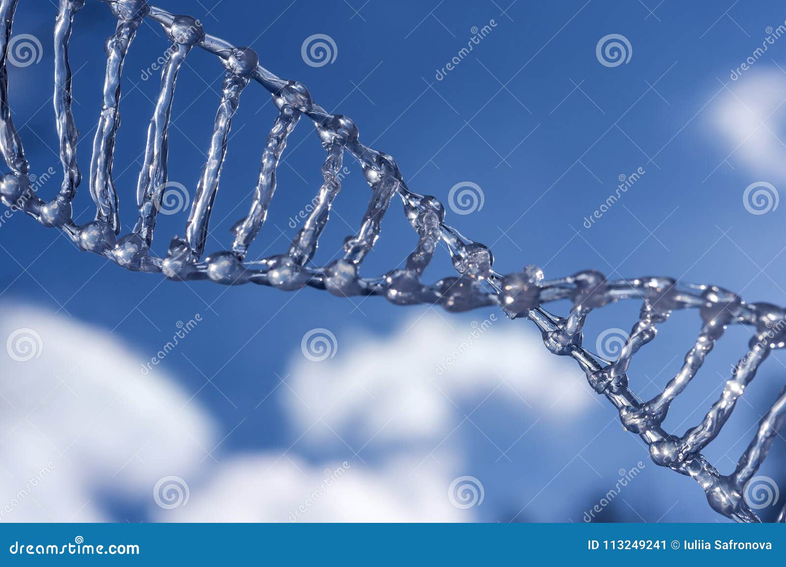 Spiral Dna Against the Blue Sky with Clouds Stock Image - Image of ...
