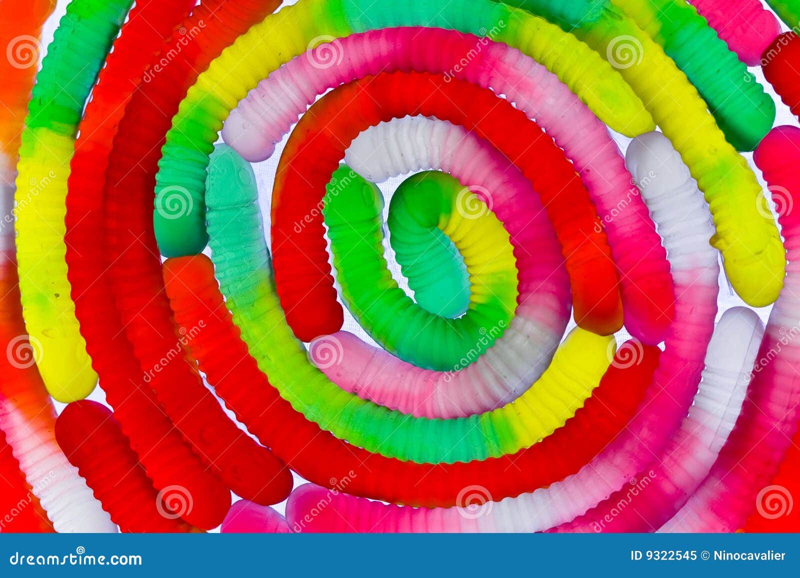 Gummy Worms Of Different Colors Lie On A White Matte Background ...