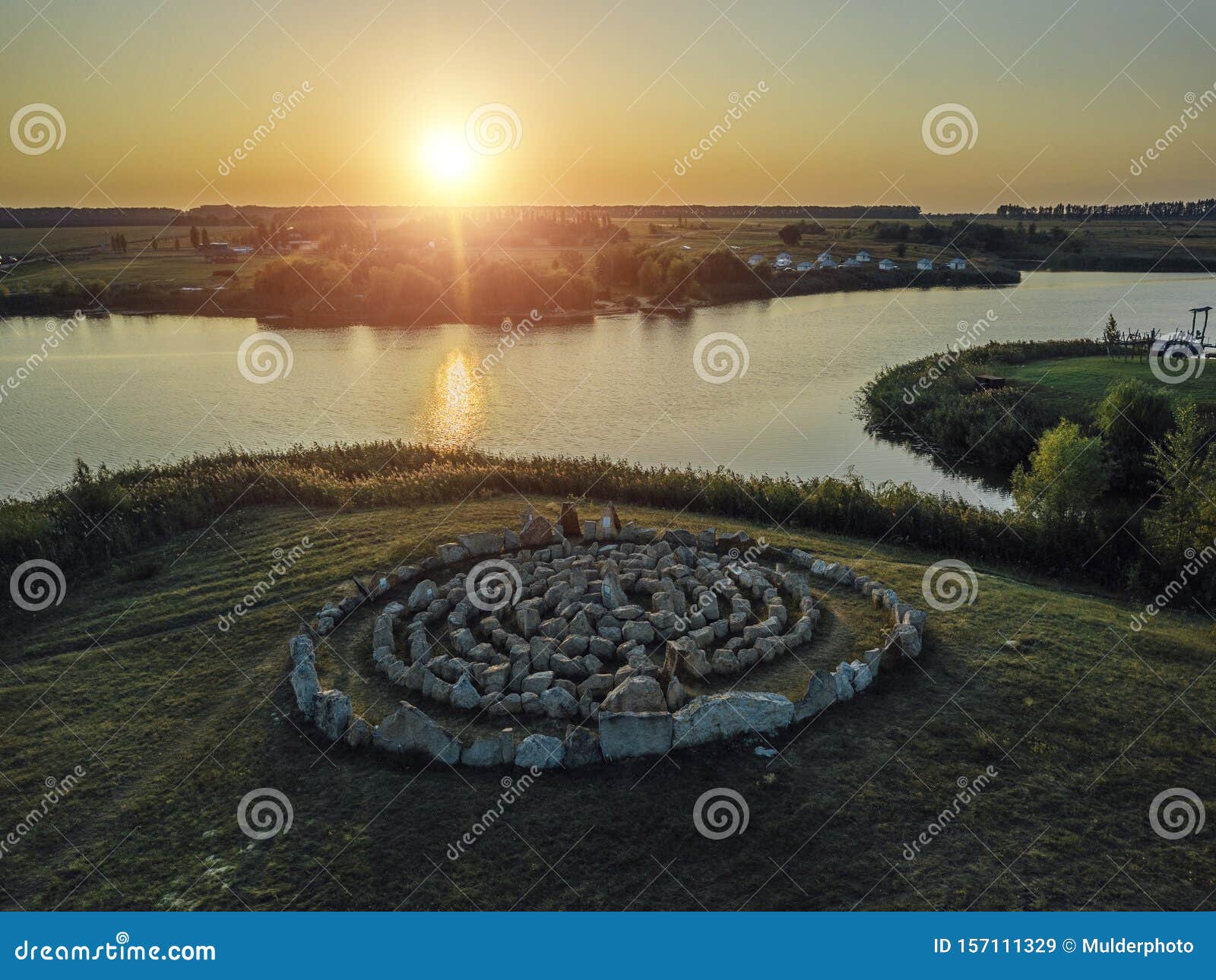 Spiral Labyrinth Made of Stones, on Sunset Lake Stock Image - Image of ...