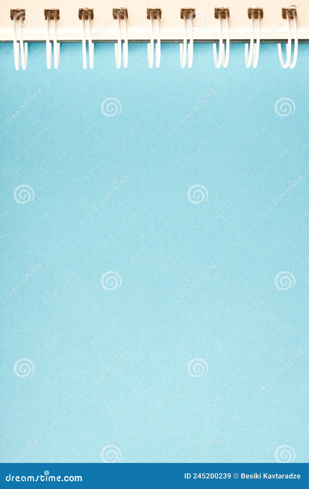Spiral Notebook on Blue Background Stock Image - Image of note ...